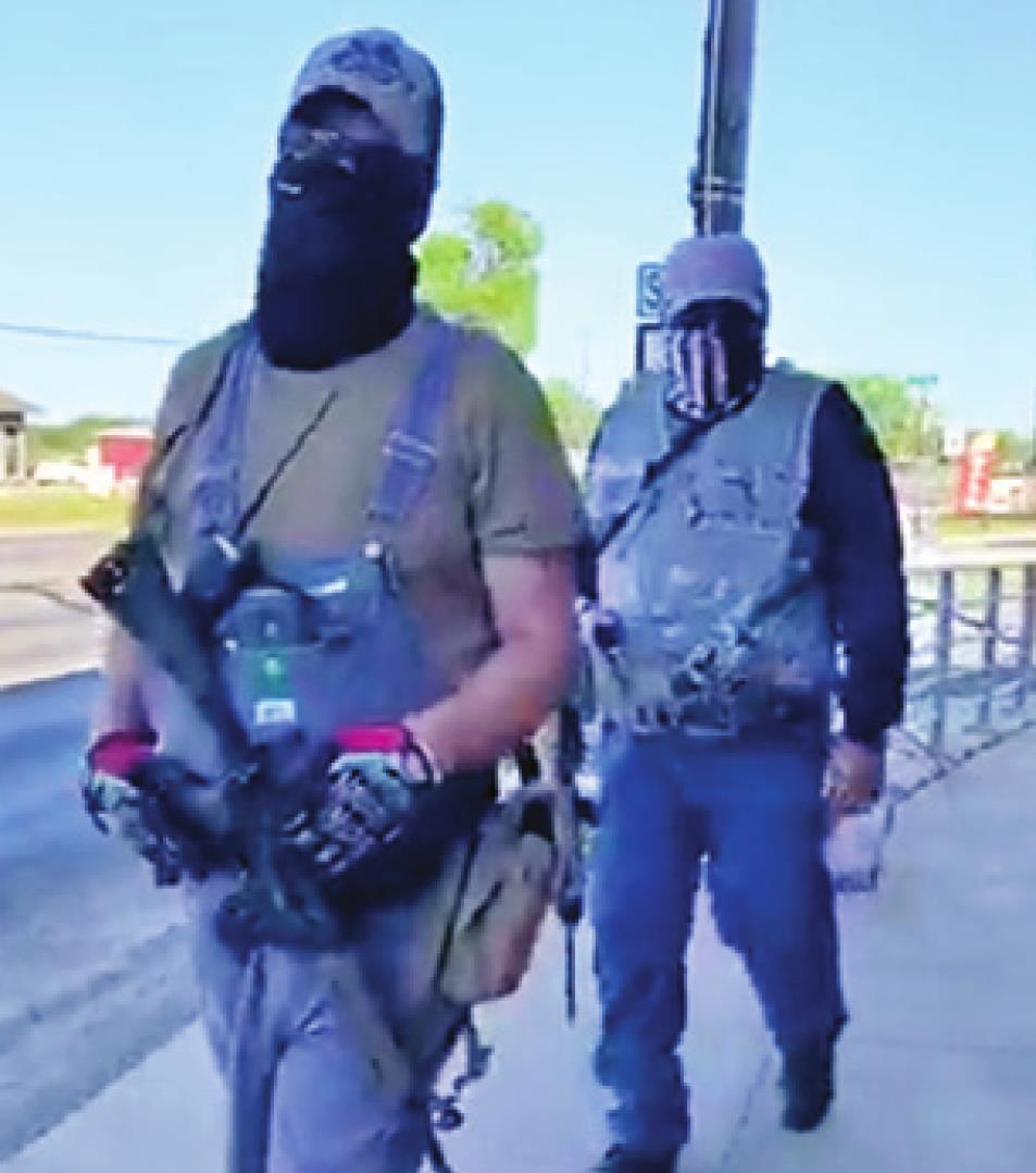 Armed men arrive at protest | Burleson County Tribune