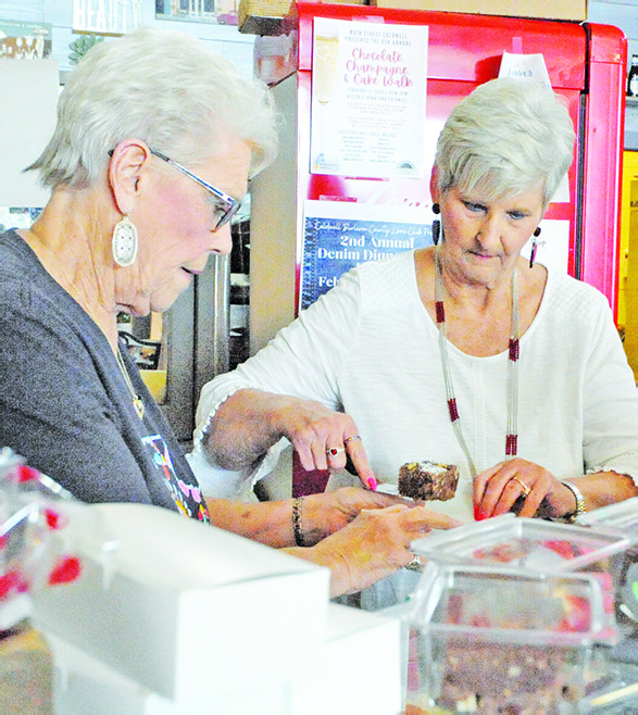 Hundreds attend annual Main St. Chocolate, Champagne, Cake Walk ...